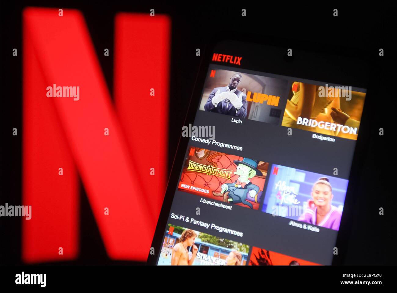 In this photo illustration the Netflix logo seen displayed on a mobile ...