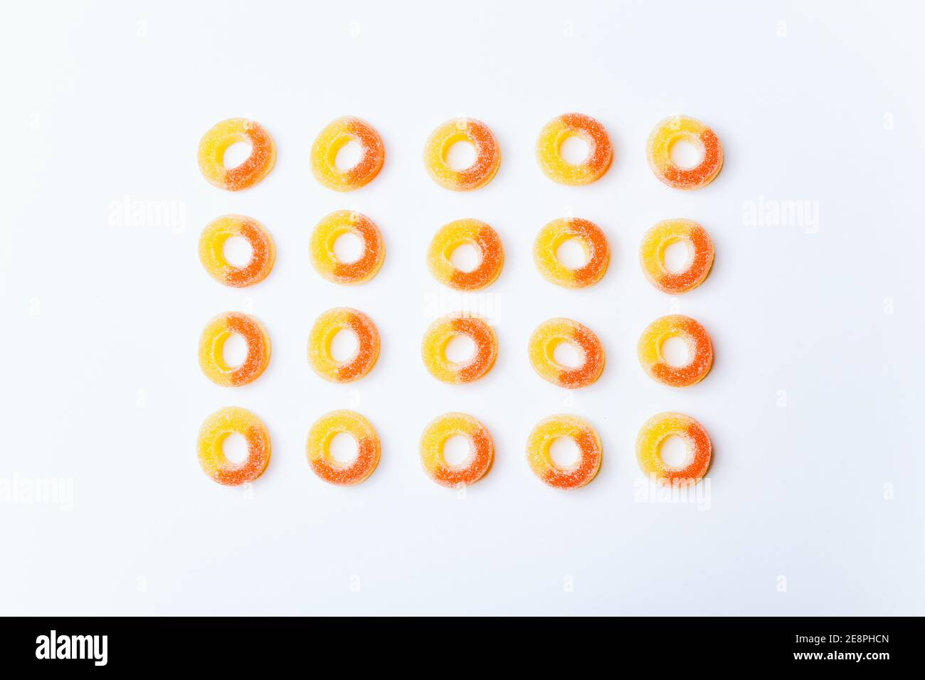 Circle jelly candies pattern on white background Stock Photo - Alamy