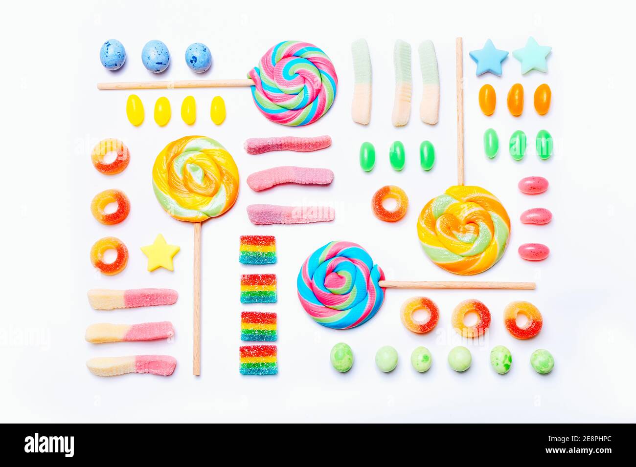 Mixed collection of colorful candy, on white background. Flat lay, top ...