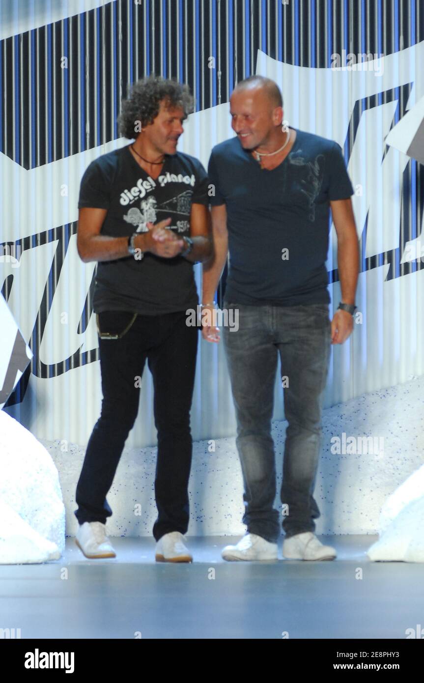 Designer Renzo Rosso appears on the runway after the Diesel collection ...