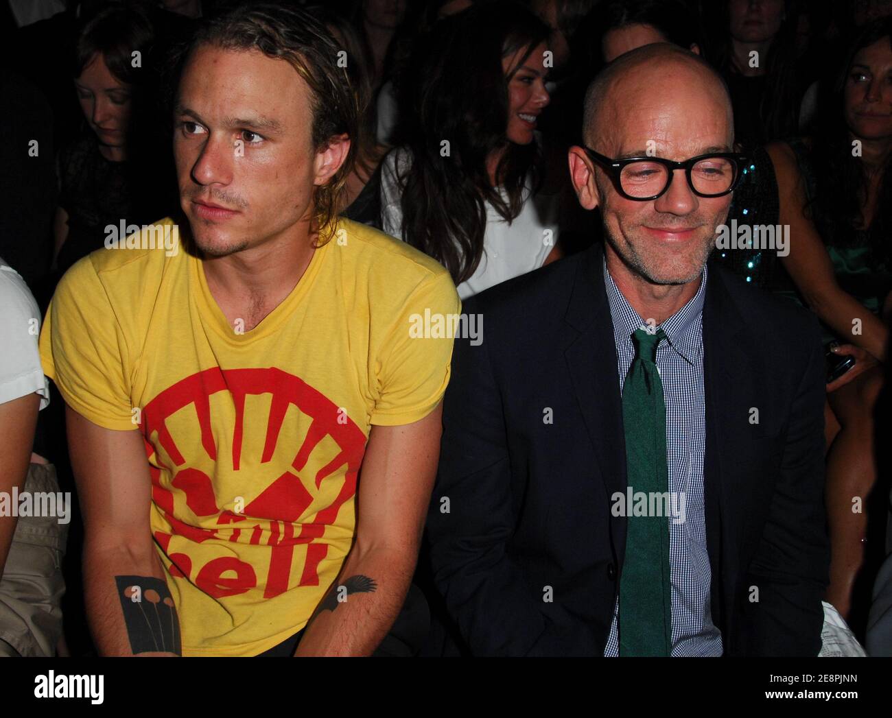Actor Heath Ledger (L) and musician Michael Stipe sit front row at the ...