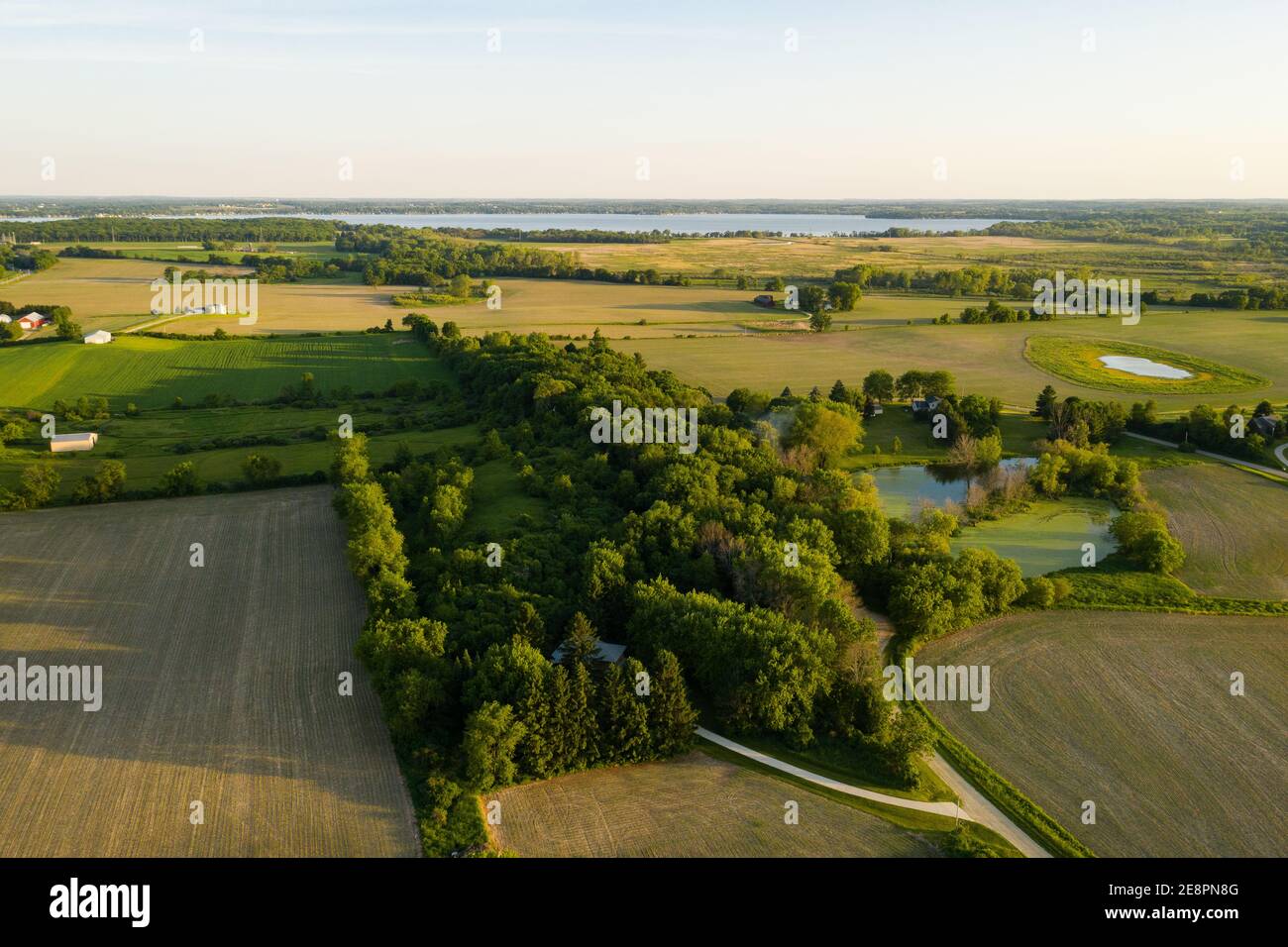 An aerial view of a beautiful country landscape with valleys and trees ...