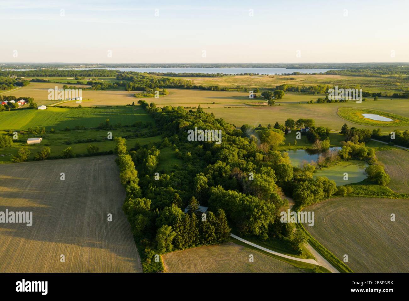 An aerial view of a beautiful country landscape with valleys and trees ...