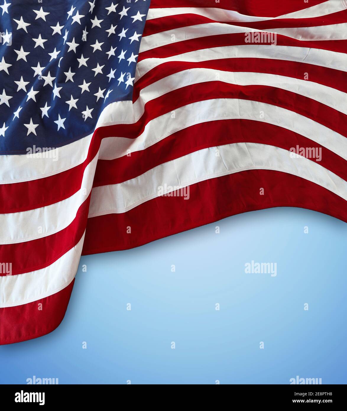 American flag on blue background Stock Photo - Alamy