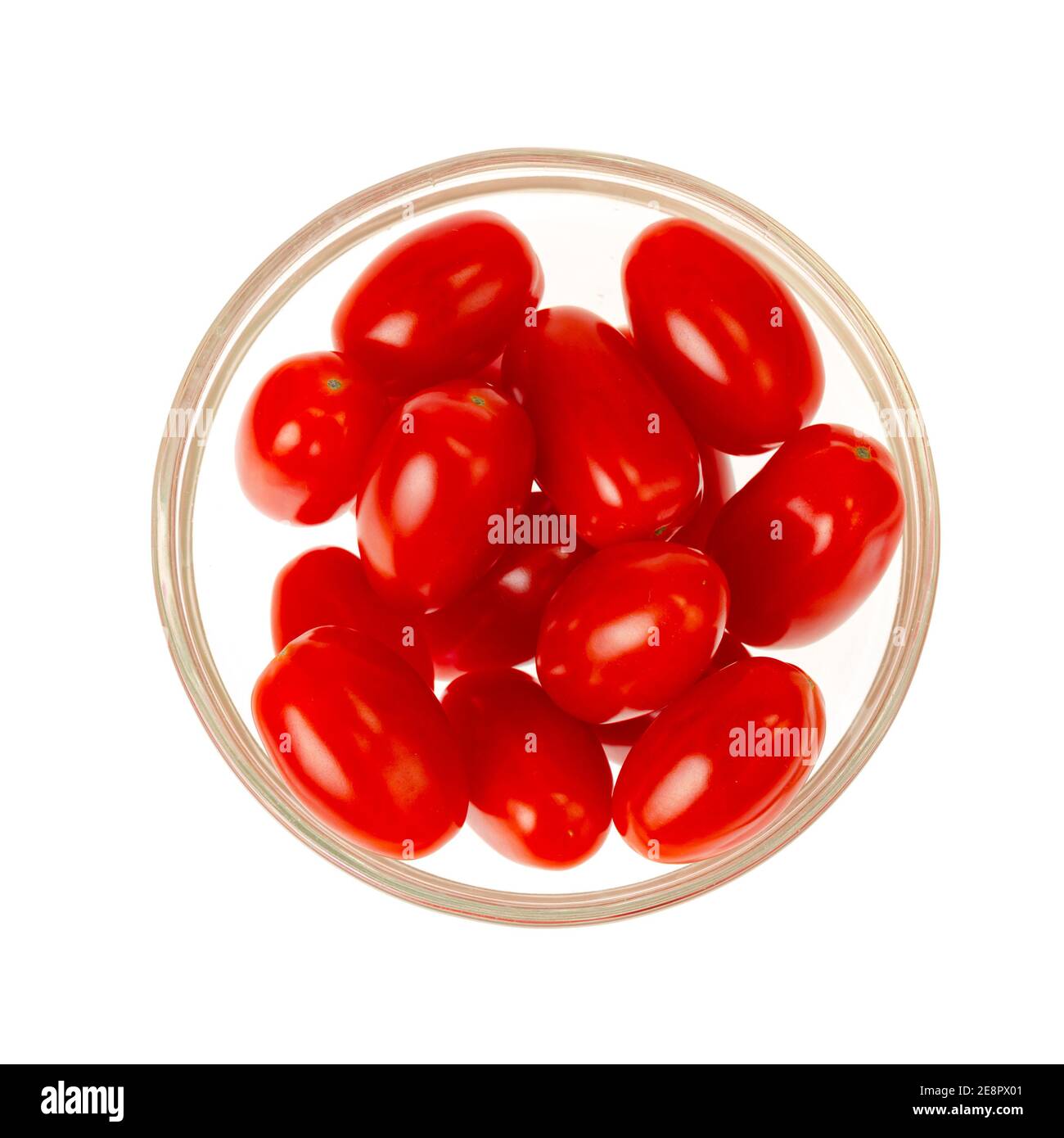 Small red oval cocktail cherry tomatoes on white background. Photo ...