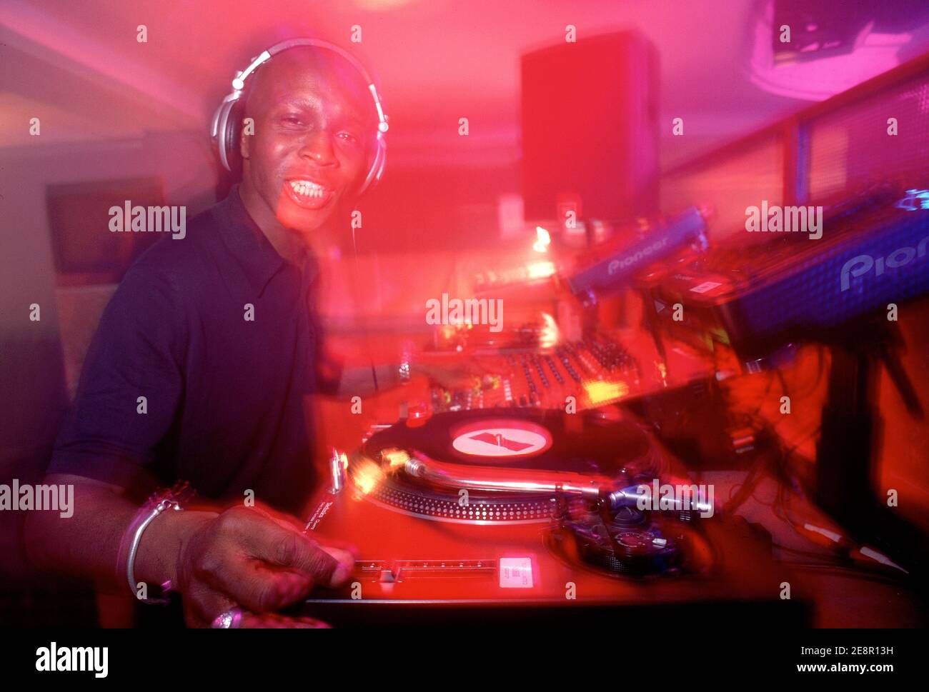 African DJ playing in the night club in London Stock Photo - Alamy