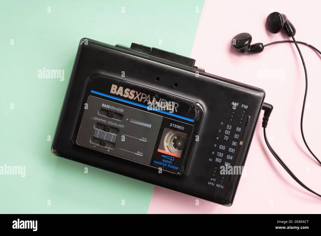 Top view of retro walkman on pink and green background Stock Photo - Alamy