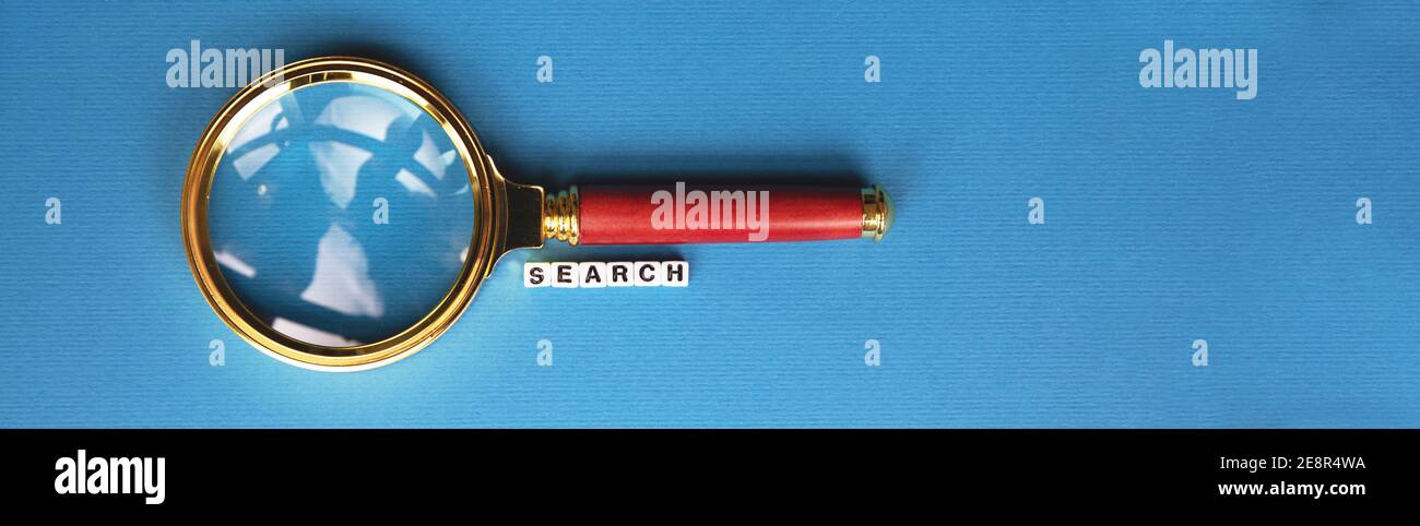 Search word through magnifying glass hi-res stock photography and ...