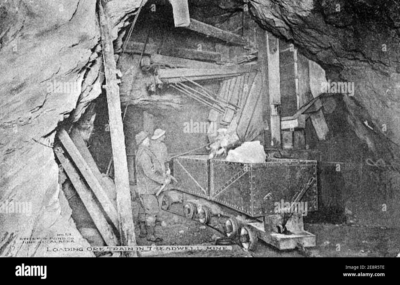 Miners loading an ore train in the Treadwell Mine, Douglas Island ...