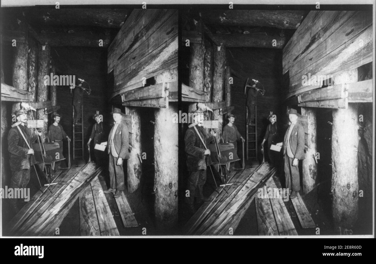 Miners pose in coal mine Stock Photo - Alamy