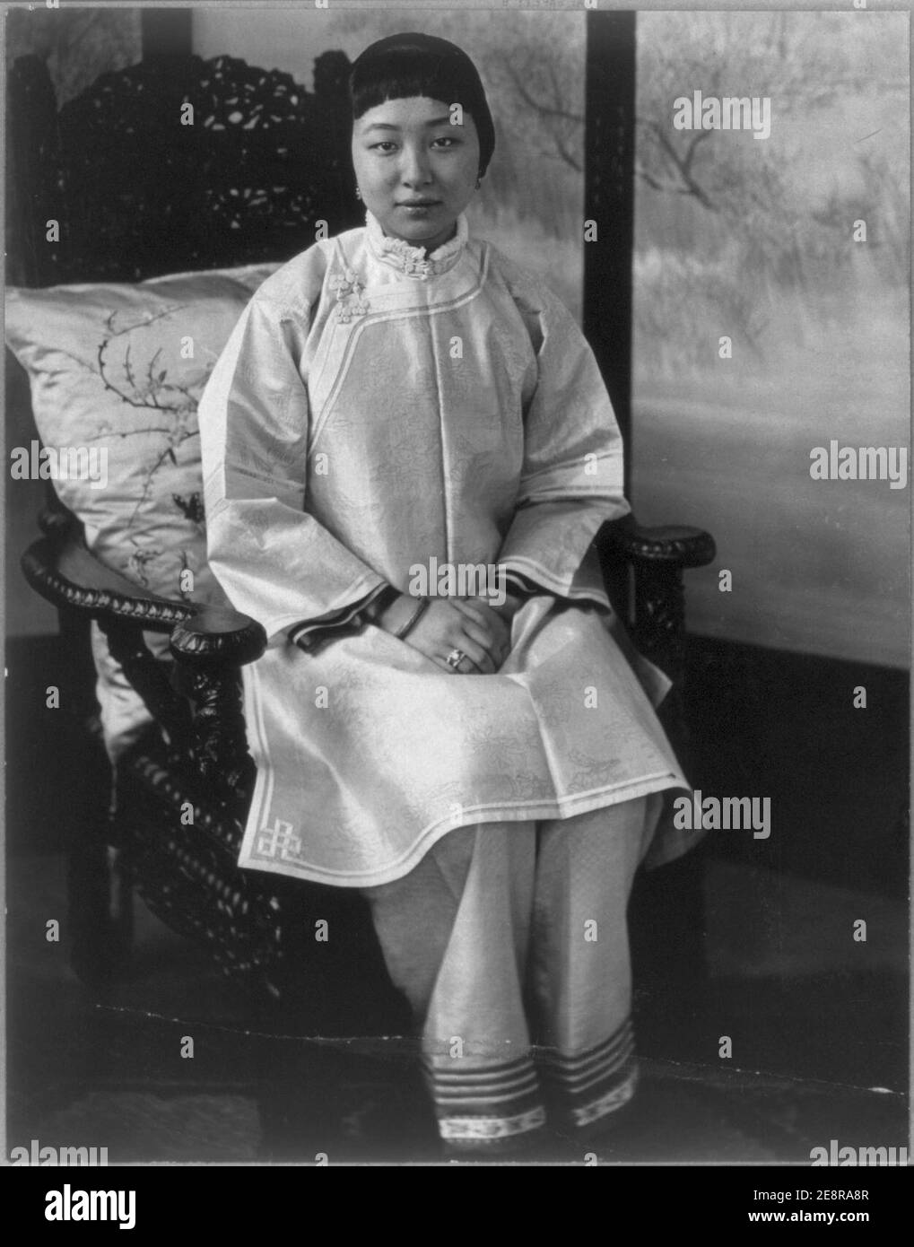Miss Chang, full-length portrait, seated, facing left Stock Photo - Alamy