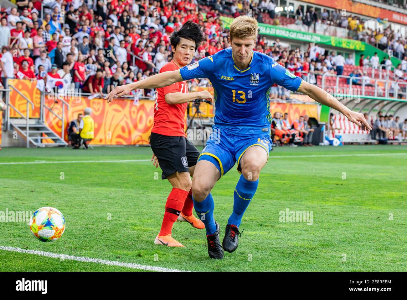 Um Won-sang of South Korea and Danylo Beskorovainyi of Ukraine are seen in action during the ...