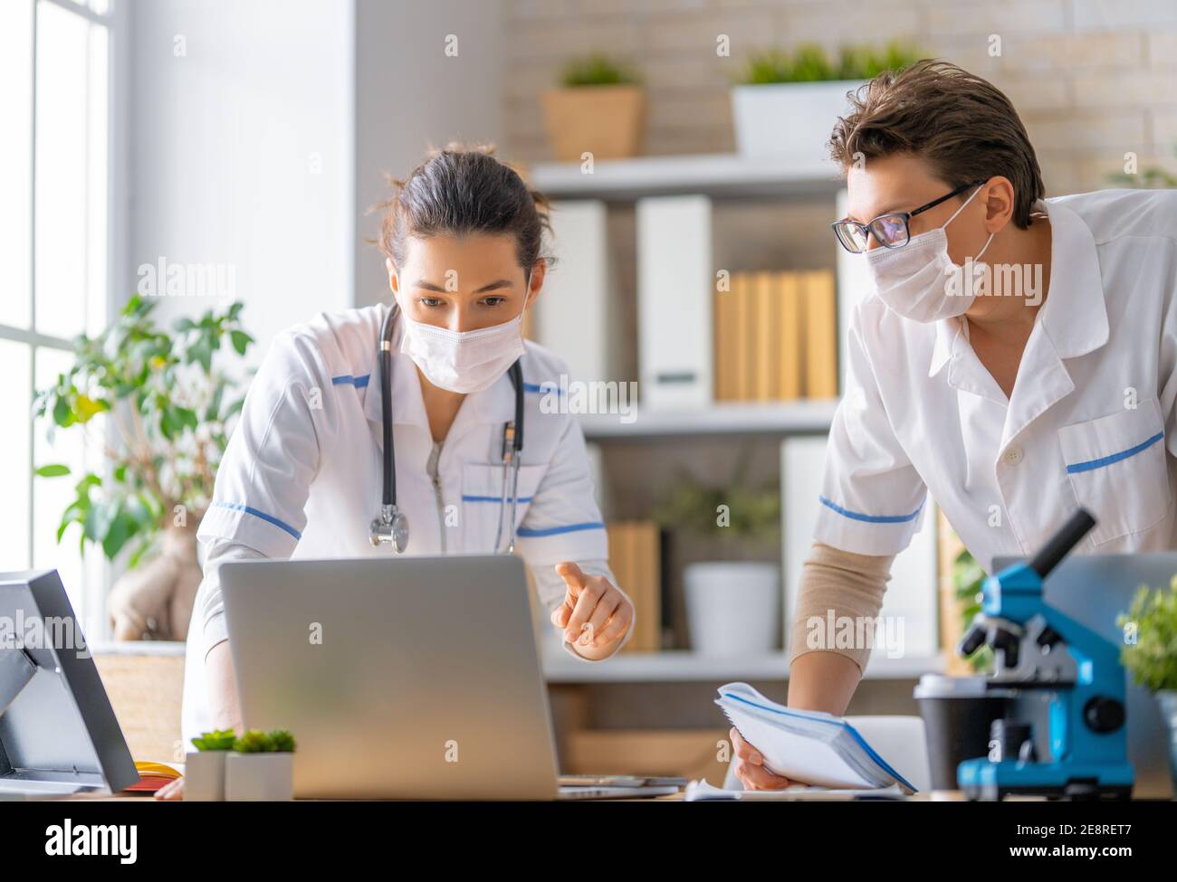 Doctors are talking. People are working in medical office Stock Photo ...