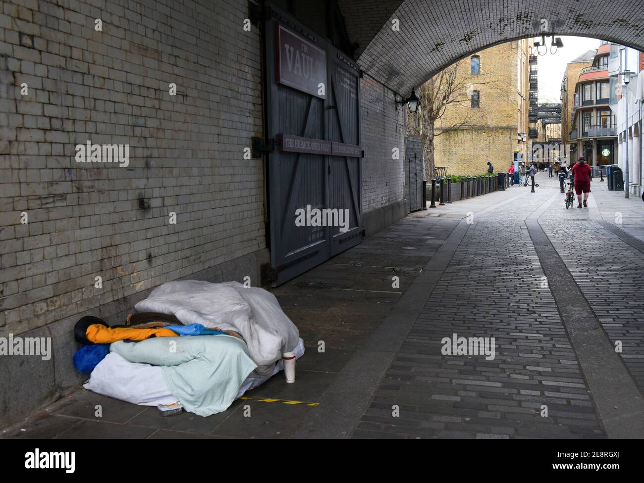 Homeless people sleeping under bridge hi-res stock photography and ...