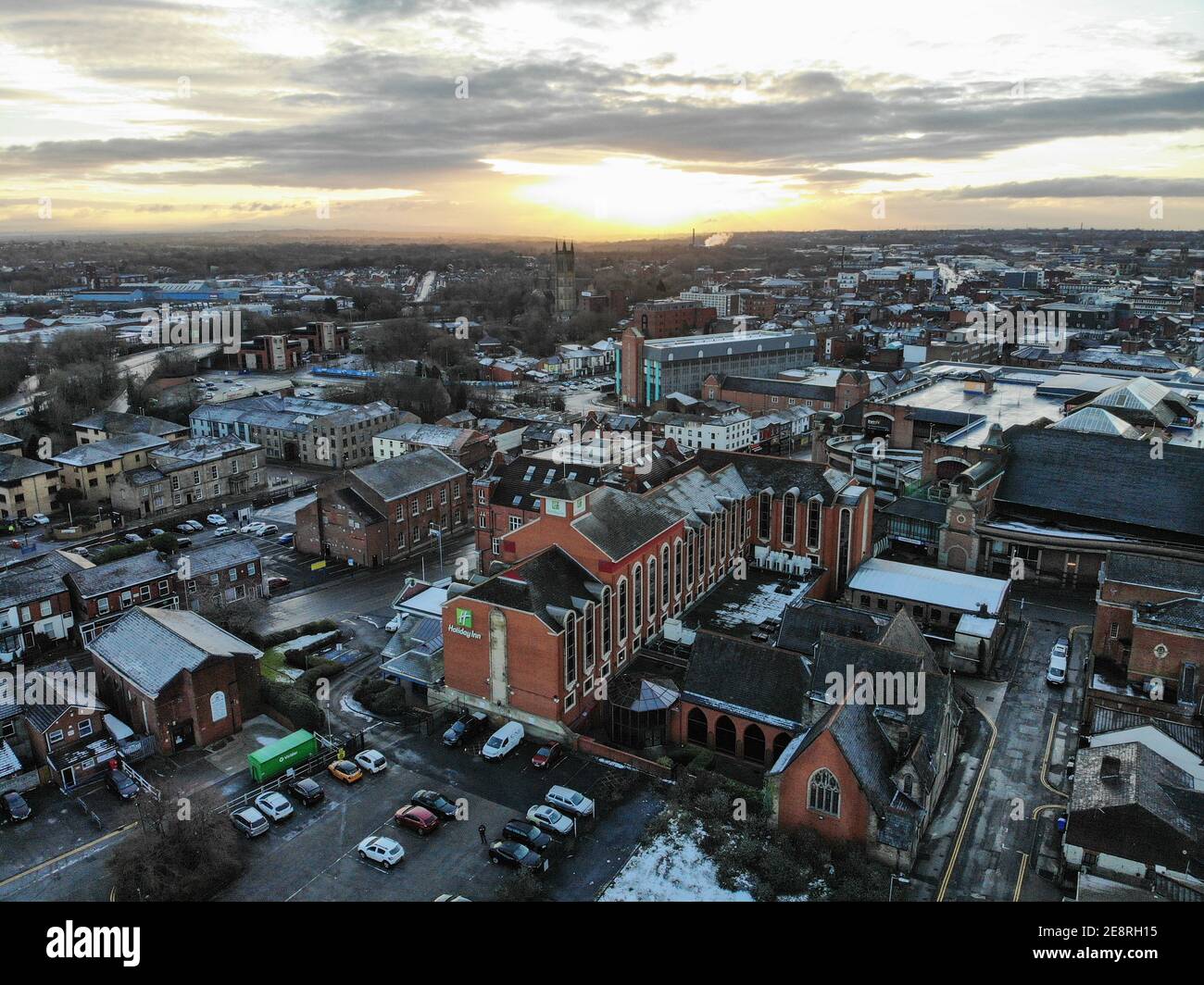 (Editor’s note: image taken by a drone) Sunrise over the city of Bolton ...