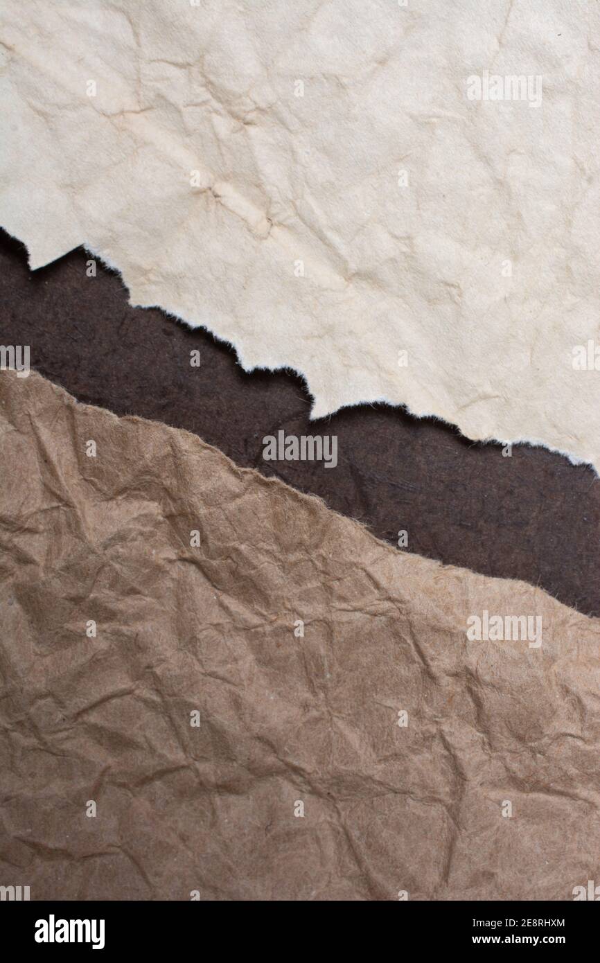 Piece of torn paper placed on plain background Stock Photo - Alamy