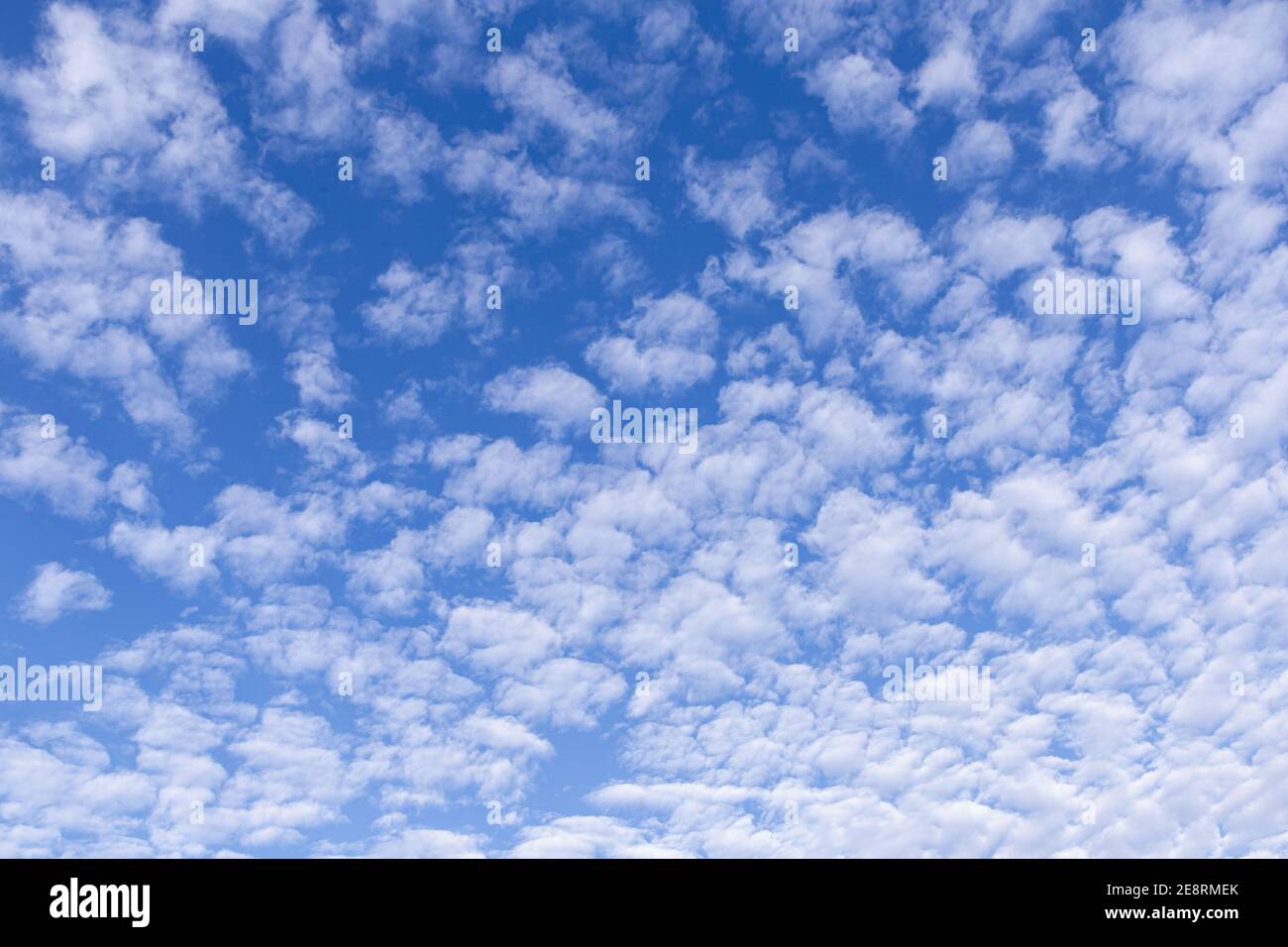 Blue sky background with clouds Stock Photo - Alamy