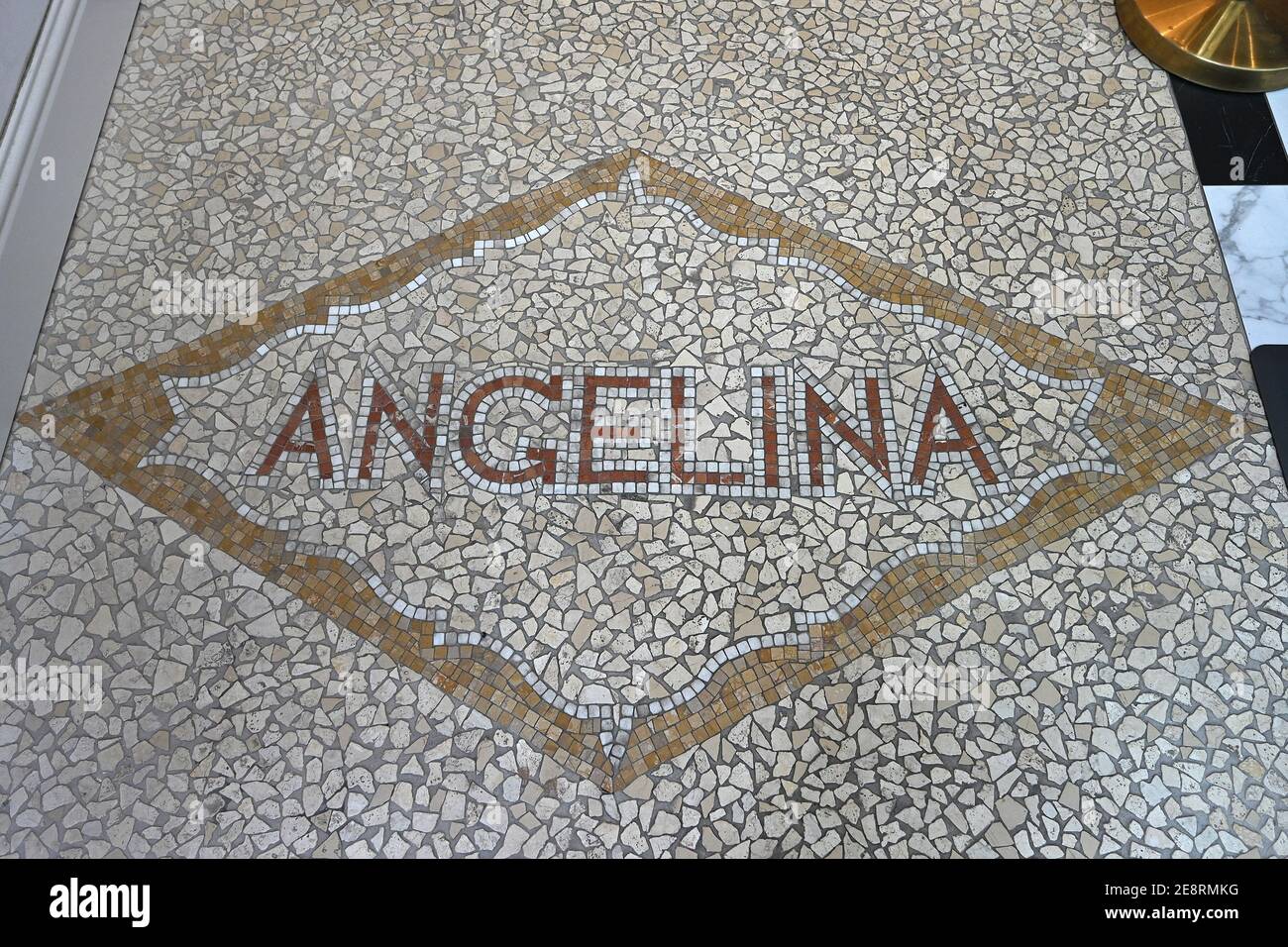 A mosaic tile design greats customers as the walk through the front ...