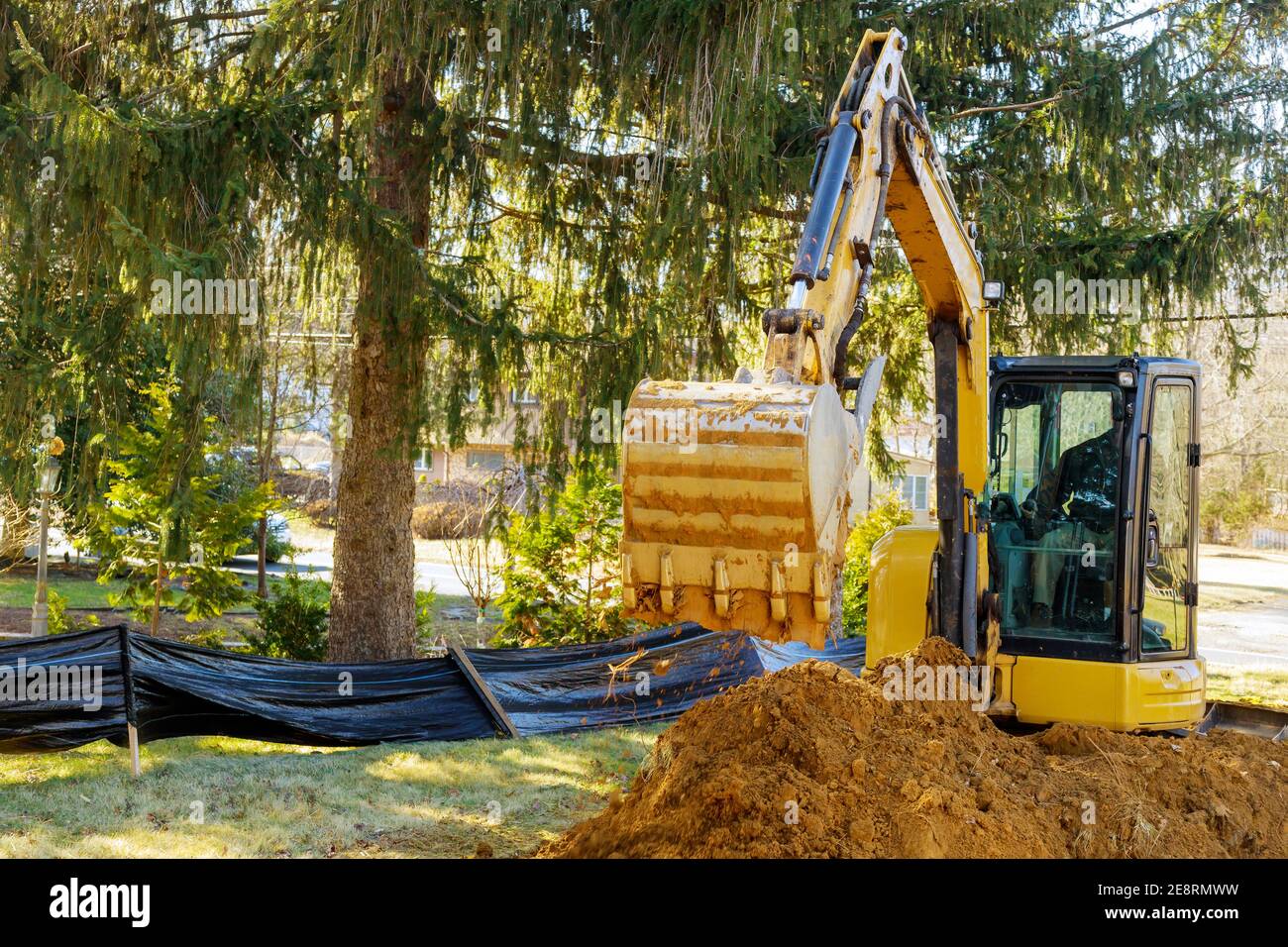 Excavator loader at earth moving works around the construction works ...
