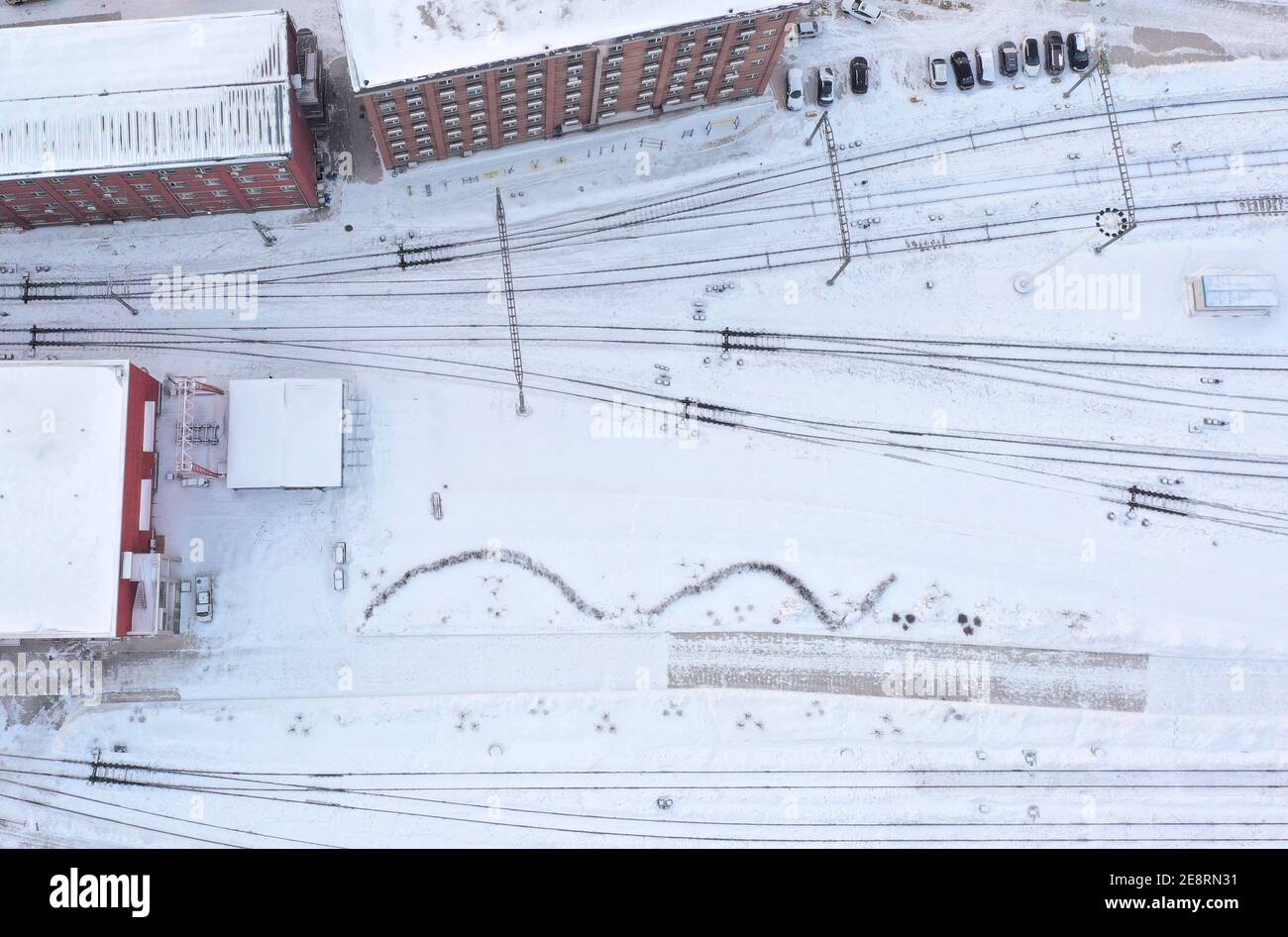 Photo taken from aerial view show the snow-covered Harbin Railway ...