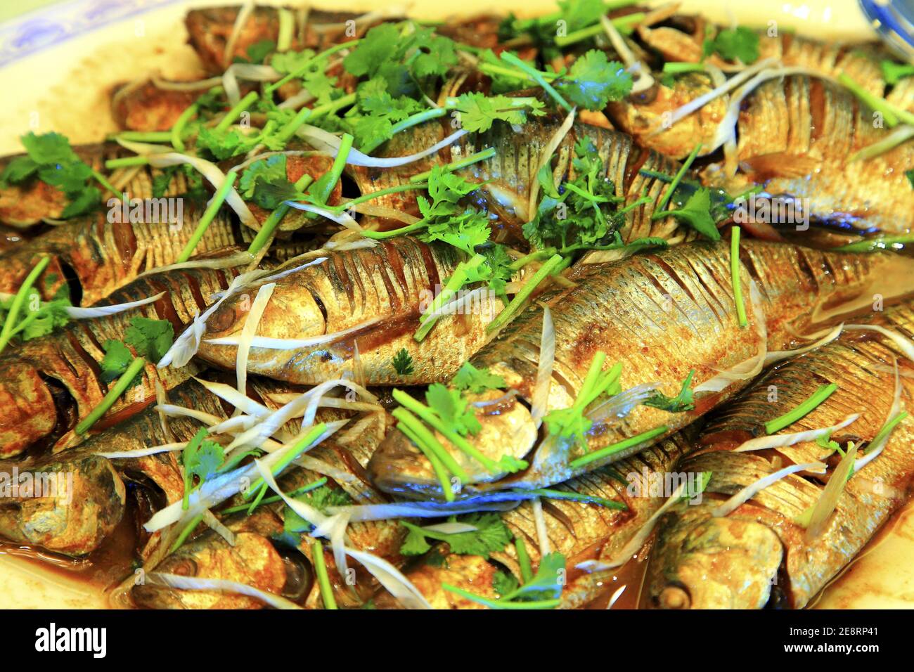 China village cooking fish hi-res stock photography and images - Alamy