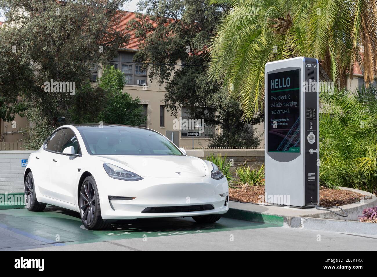 Tesla car shown at a free charging station in the City of Pasadena in ...
