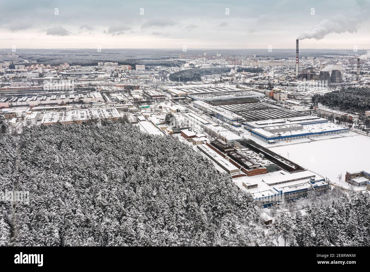urban industrial area in winter. factory buildings, warehouses and ...