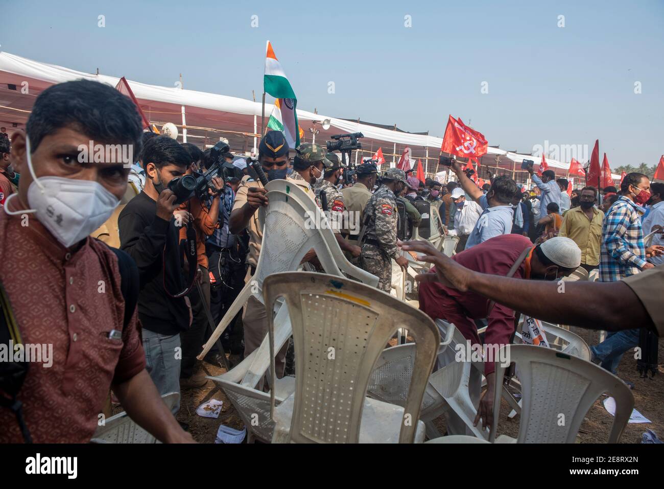 Mumbai , India - 25 January 2021, Crowd throw chairs during rally at ...