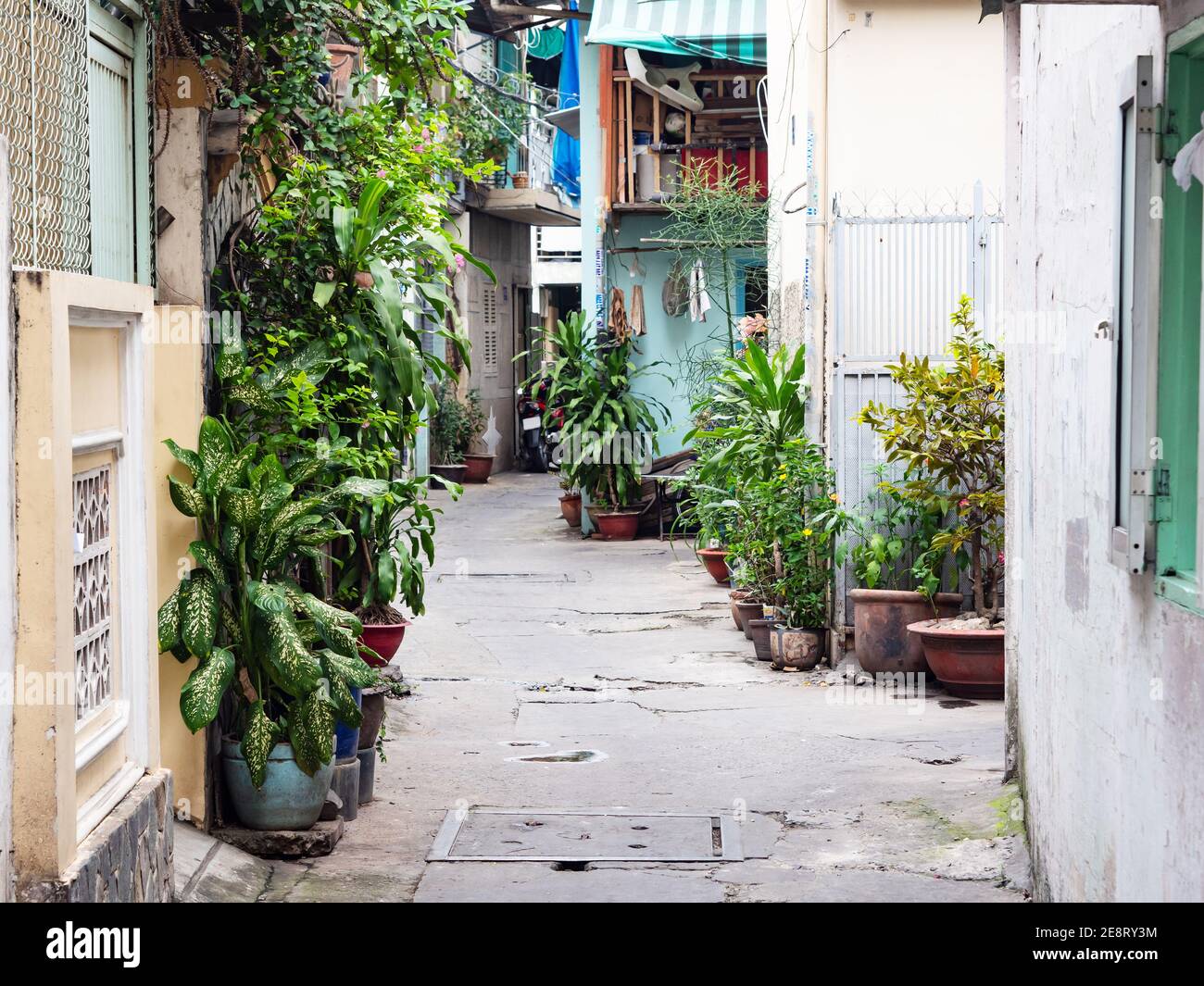 Narrow backstreet in residential area of Ho Chi Minh City, Vietnam ...