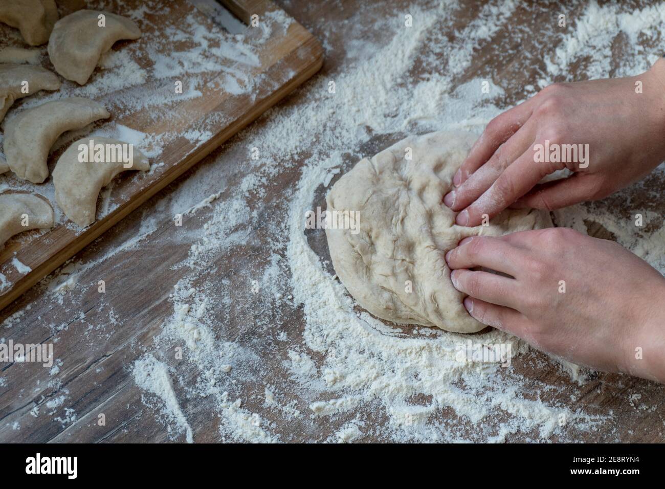 Dough preparation process knead hands hi-res stock photography and ...