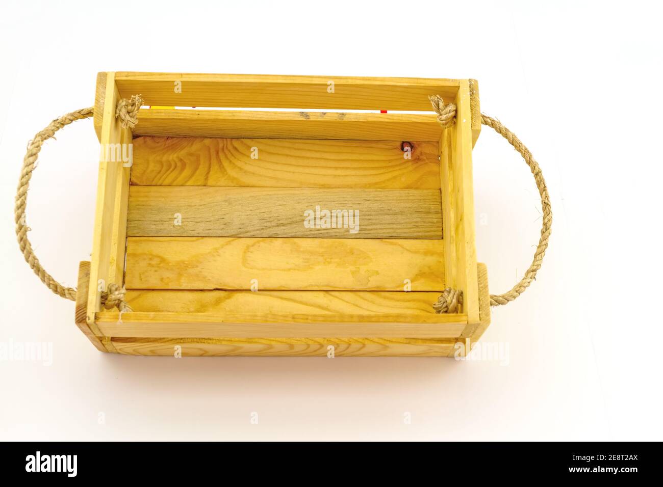 Empty wooden box from rubber tree and sisal rope isolated on white ...