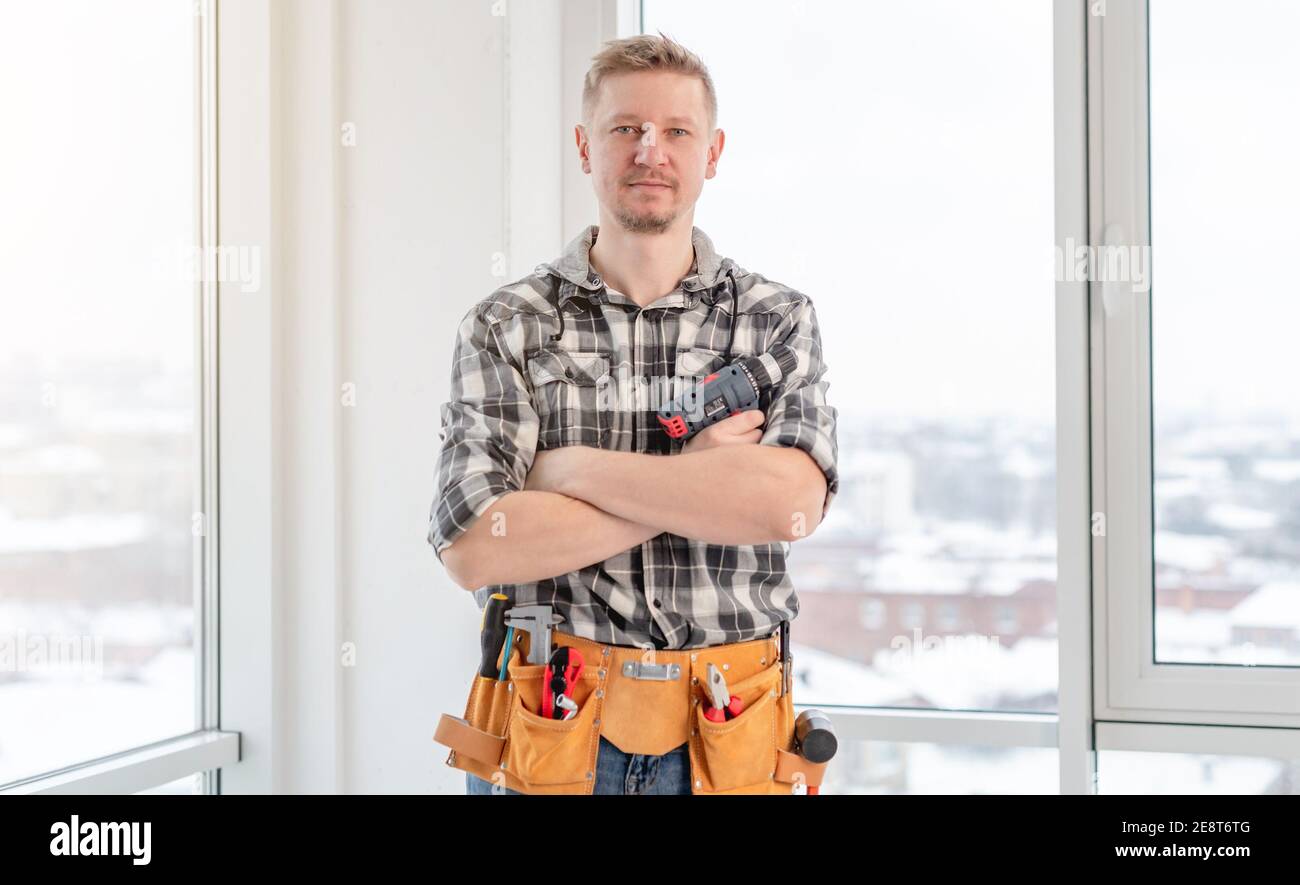 Man wearing tool belt hi-res stock photography and images - Alamy