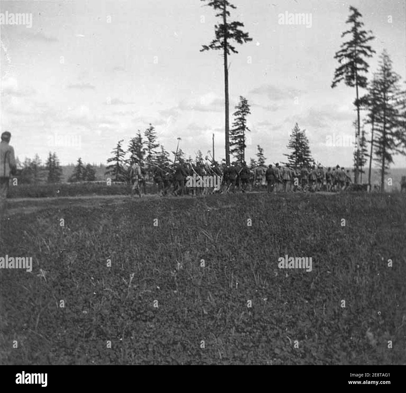Military cadets walking home on the grounds of Fort Lawton, May 1900 ...