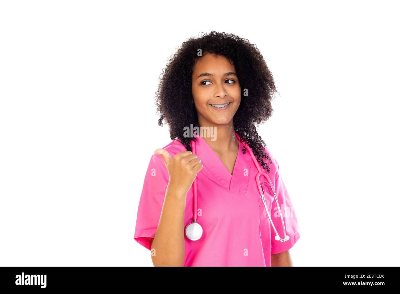 Adorable little doctor with pink uniform isolated on a white background ...