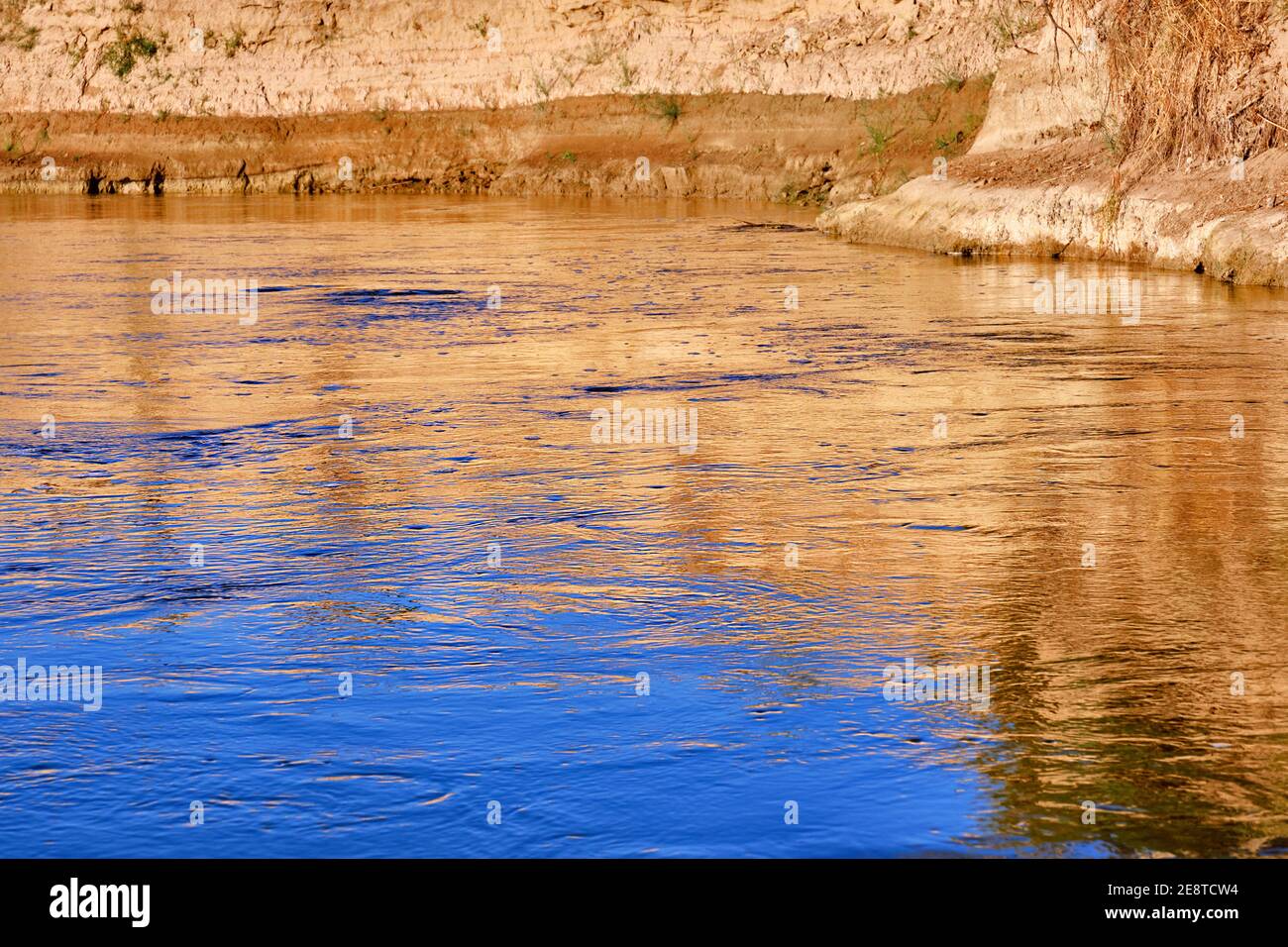 Calm river flow with delightful ripples in the water Stock Photo - Alamy