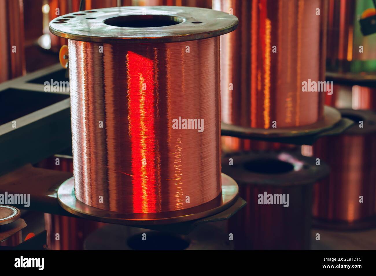 Copper wire reels in cable factory close up Stock Photo - Alamy