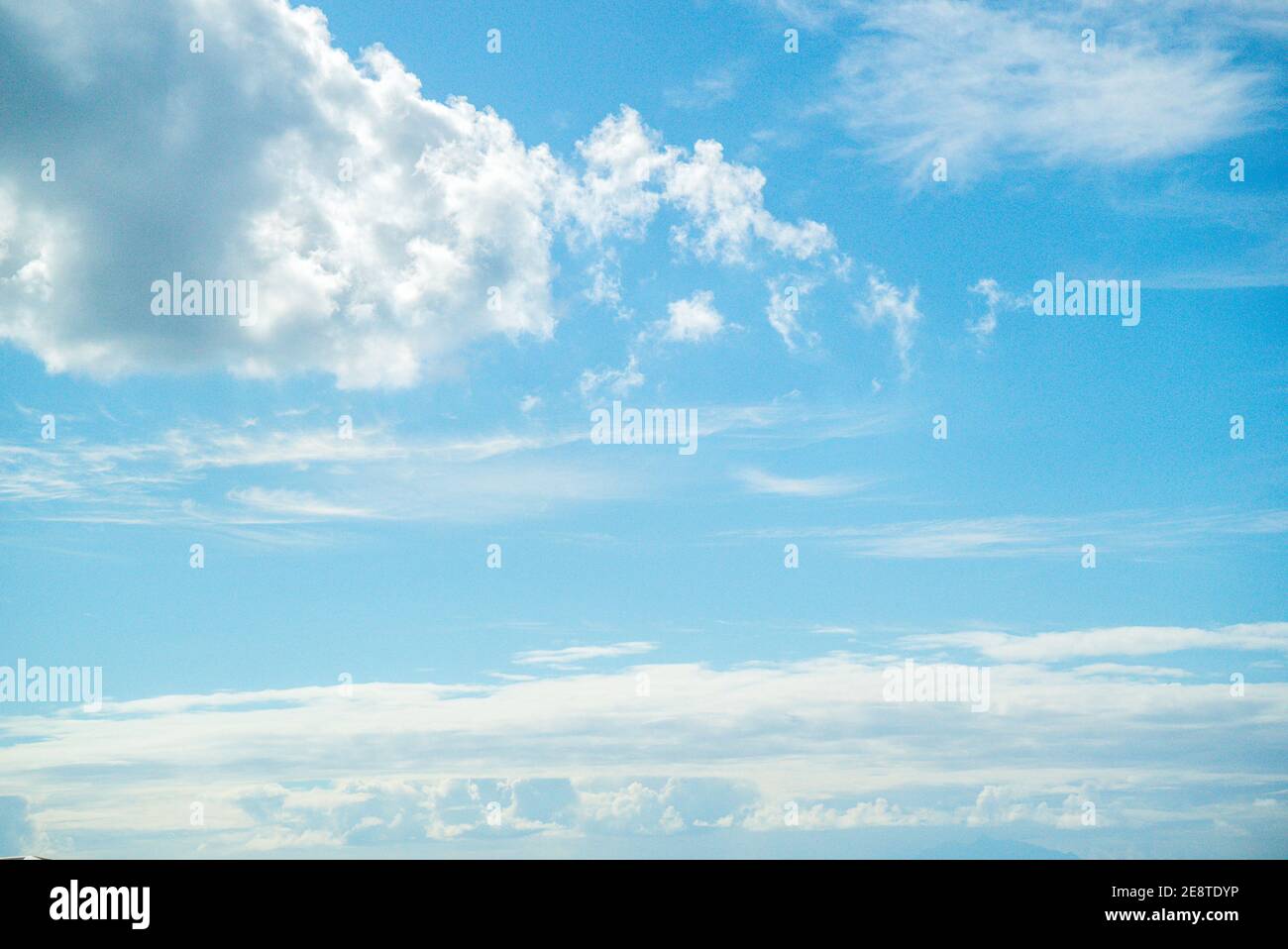 Beautiful white cloudy sky with the sun rising Stock Photo - Alamy