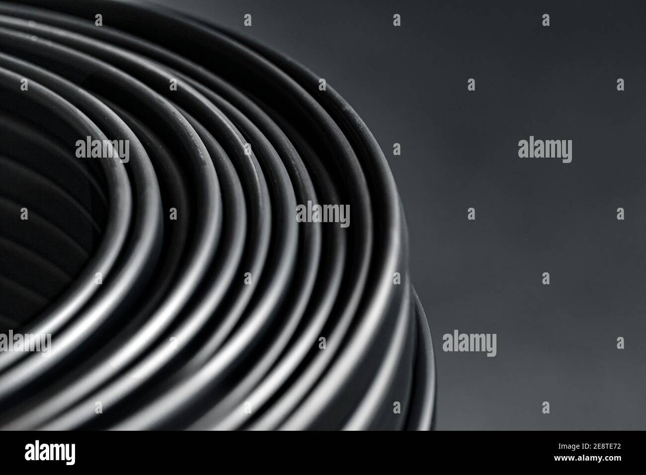 Roll black electrical cable close hi-res stock photography and images ...