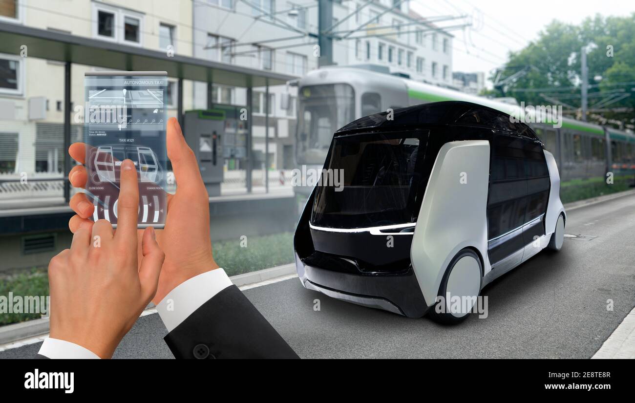 Control of self driving taxi by mobile app. Hand with phone on a ...