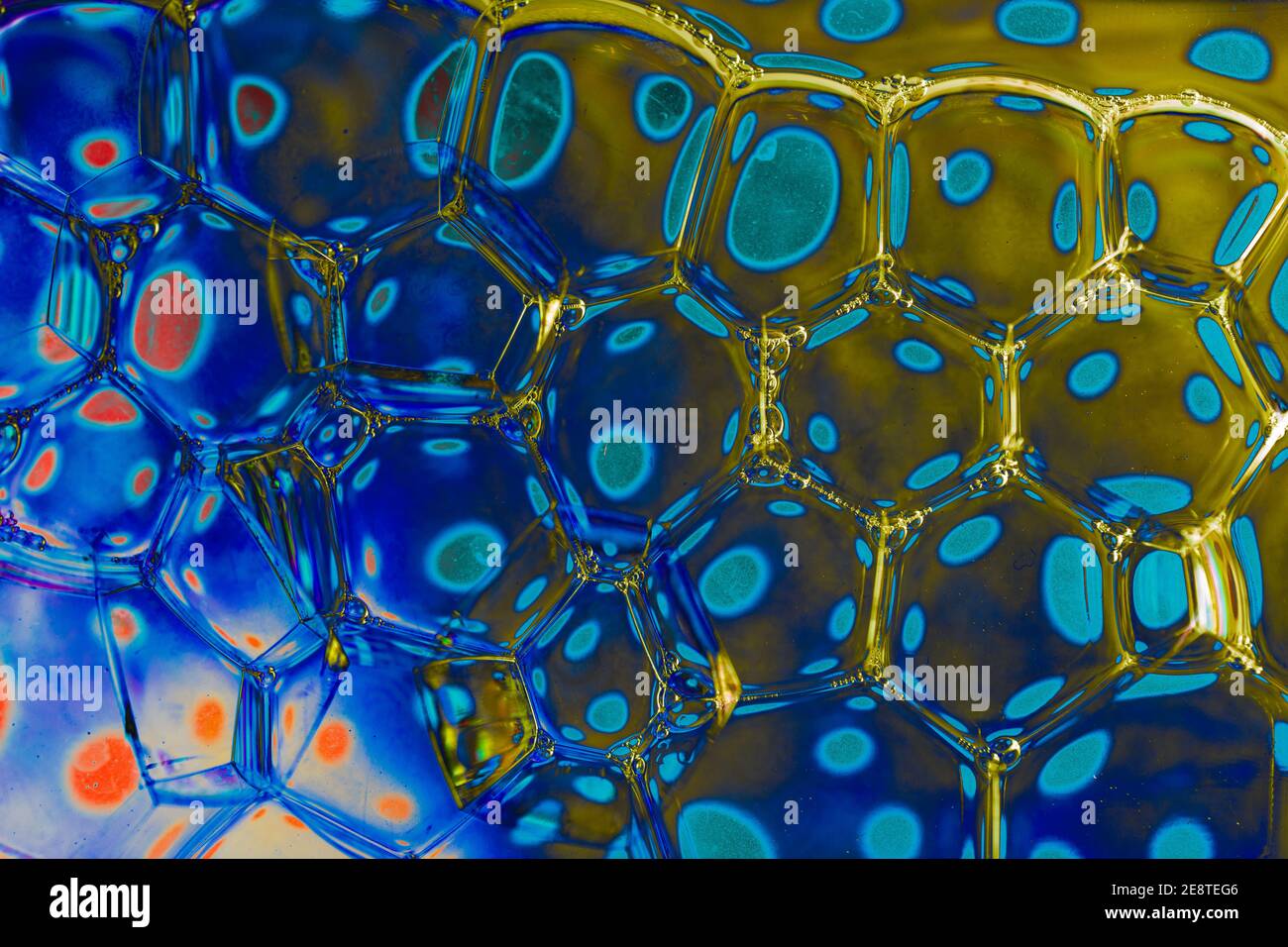 Oil bubbles inside water base form patterns Stock Photo - Alamy