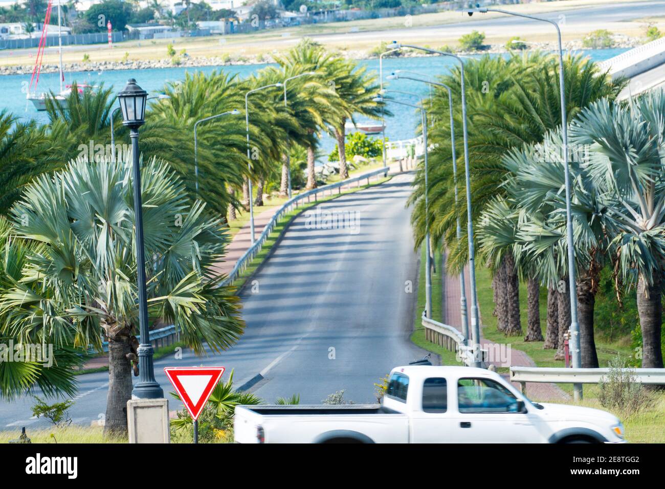 Single road leading to the causeway bridge on the Caribbean island of ...