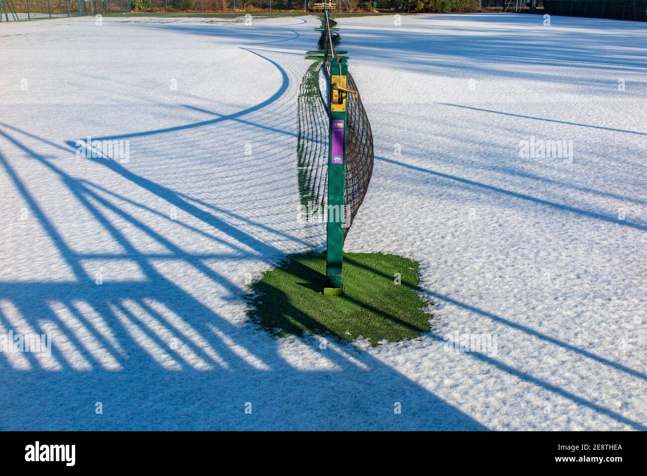 Tennis courts covered in snow in park hi-res stock photography and ...