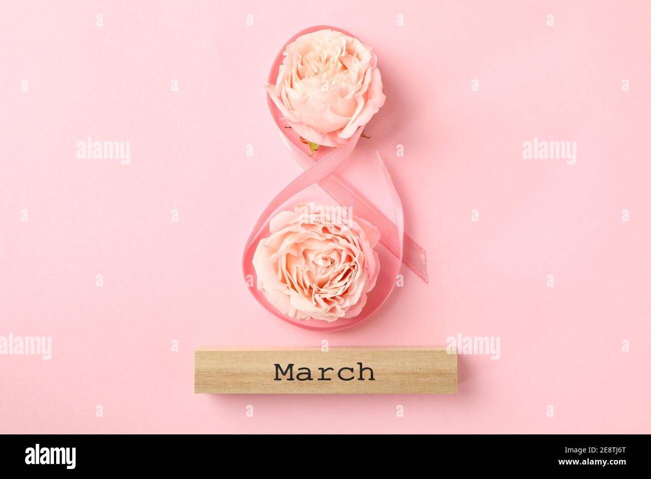 8 made of ribbon, wood block with text March and roses on pink ...