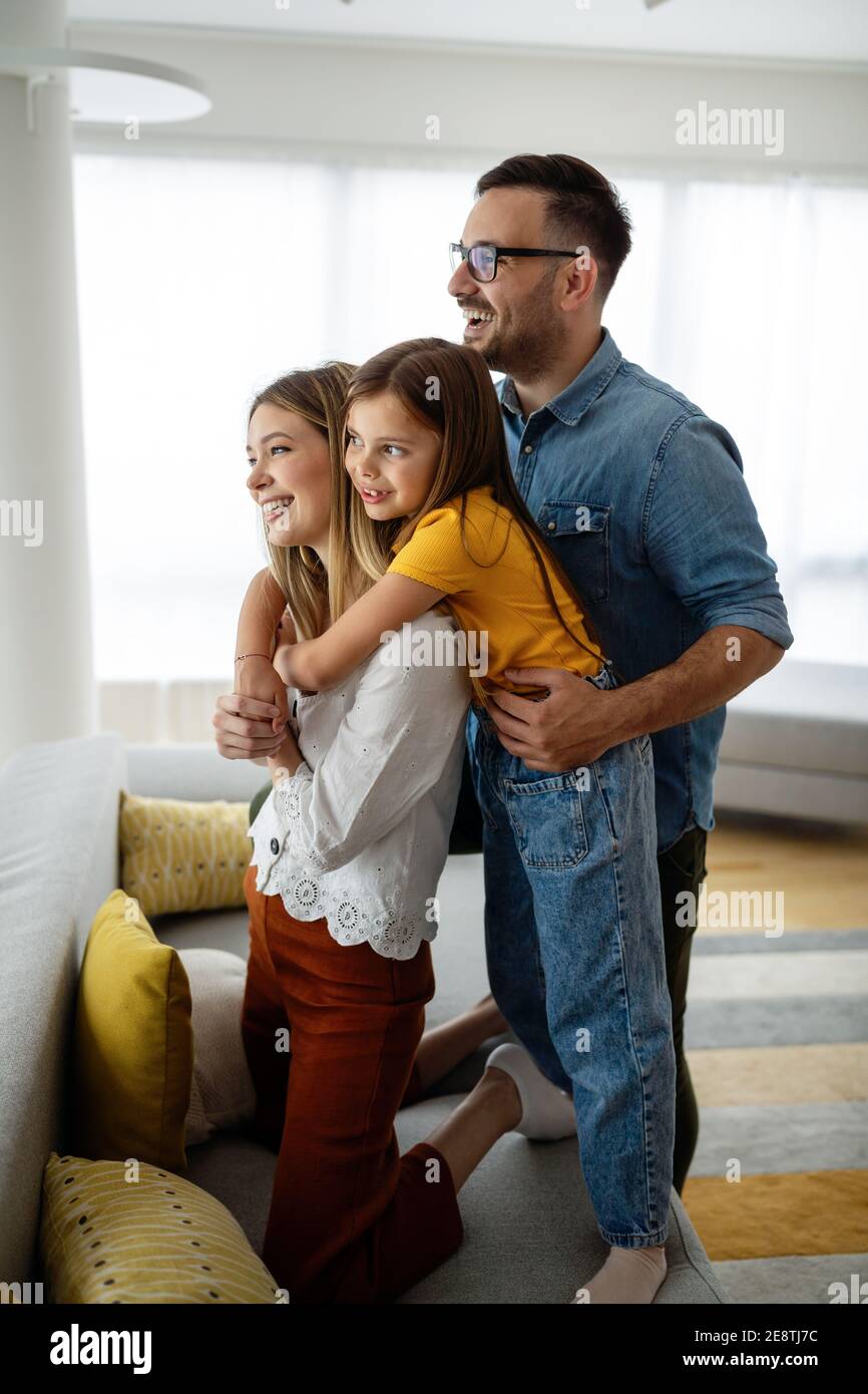 Happy family having fun times at home Stock Photo - Alamy