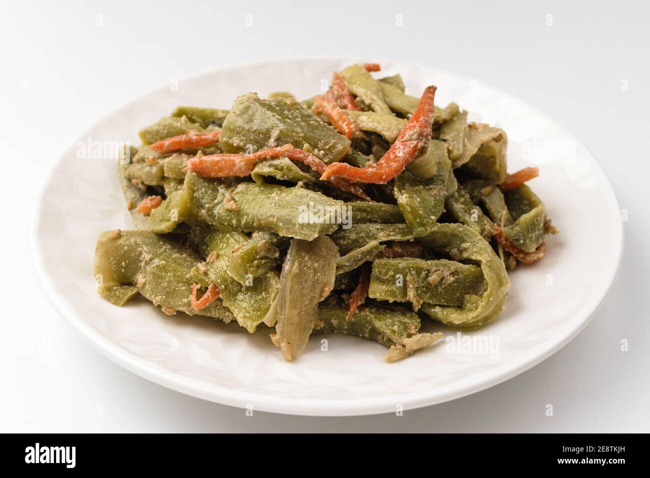 Stem lettuce herbs on white background Stock Photo - Alamy