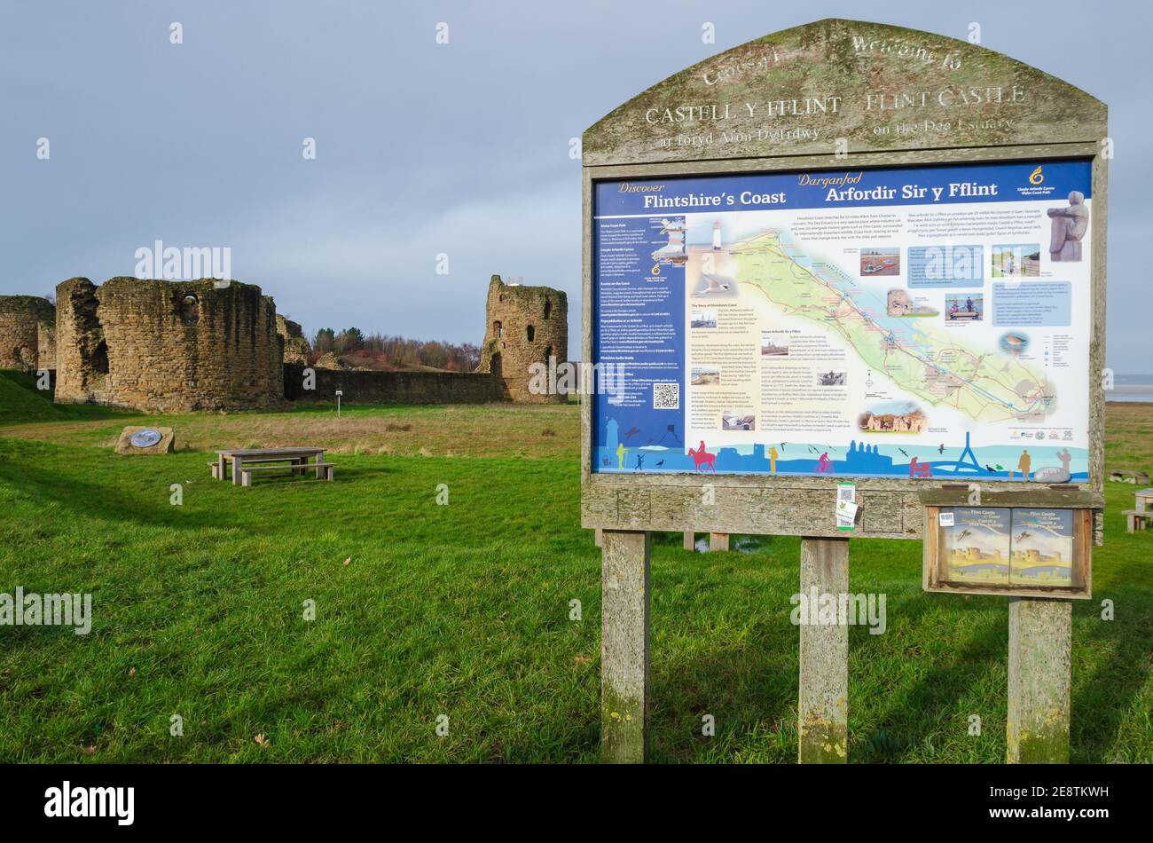 Flint; UK: Jan 28, 2021: Information board beside Flint Castle with ...