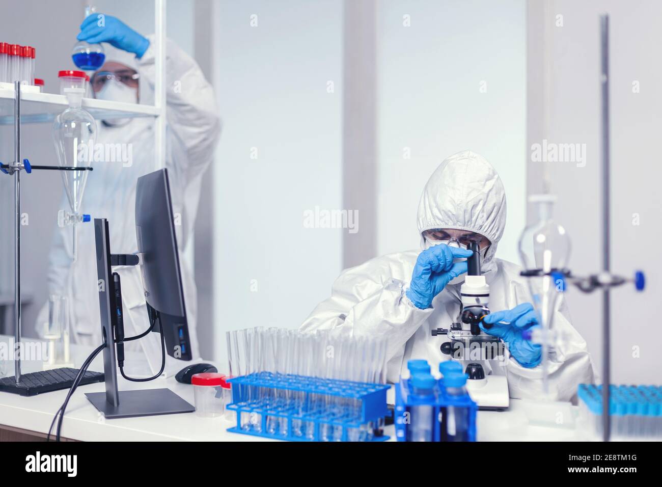 Team of medical scientist in modern laboratory searching for ...