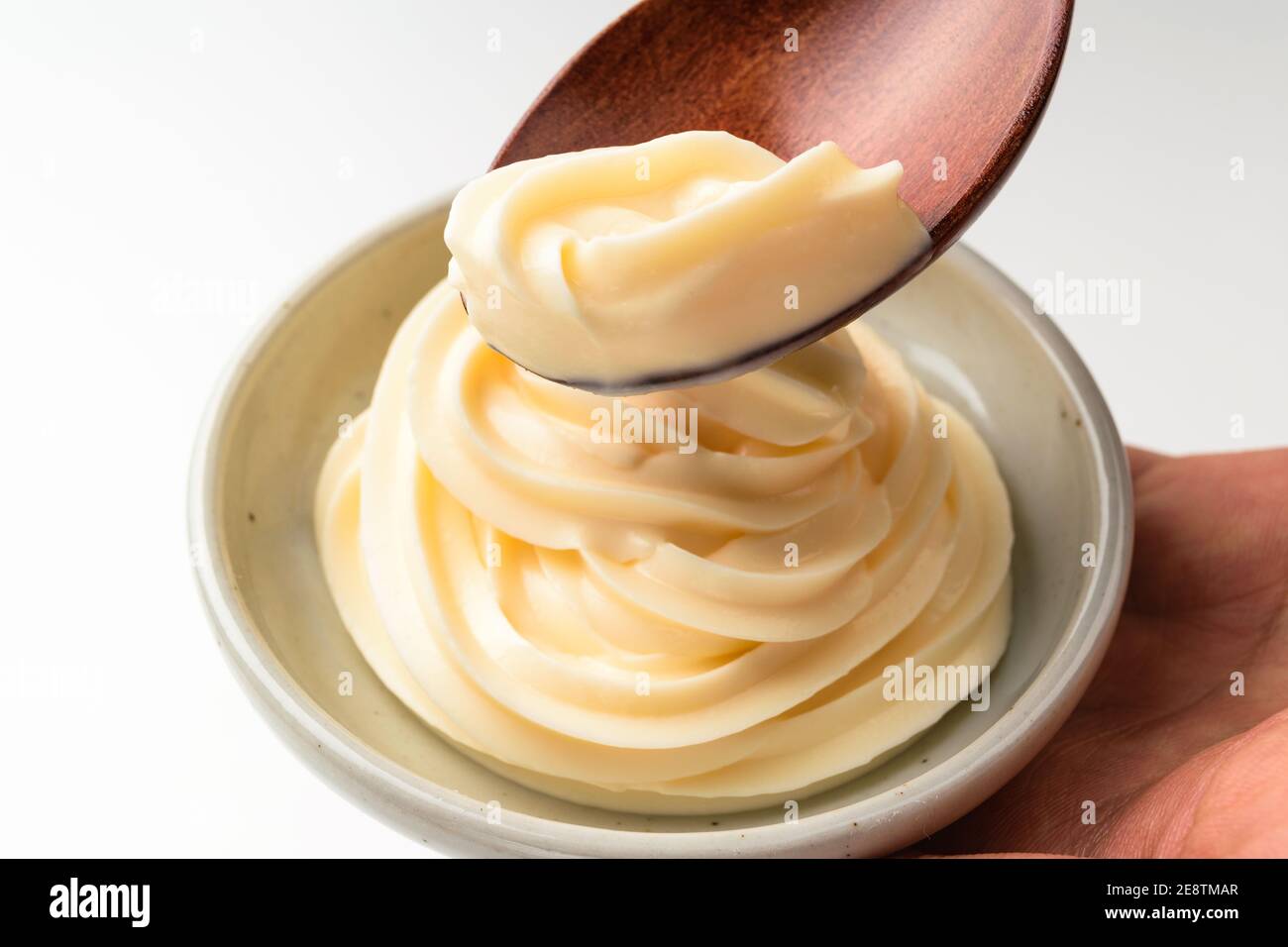 Vegetable mayonnaise on a white background Stock Photo - Alamy
