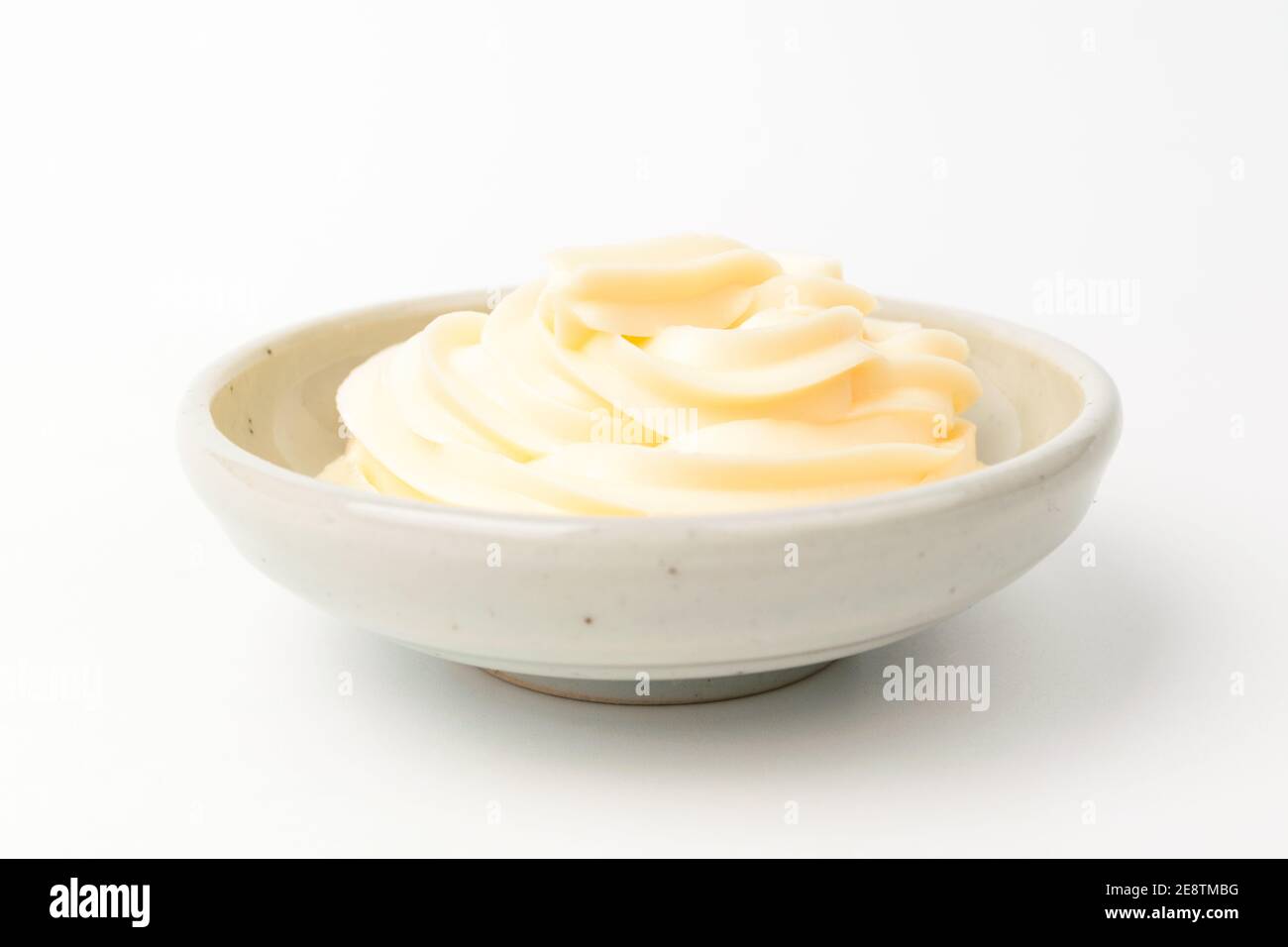 Vegetable mayonnaise on a white background Stock Photo - Alamy