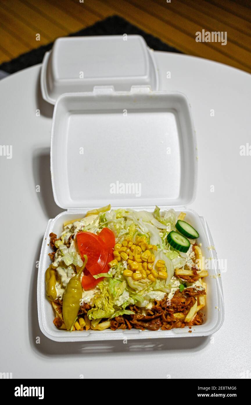 junk food in plastic box on table Stock Photo - Alamy